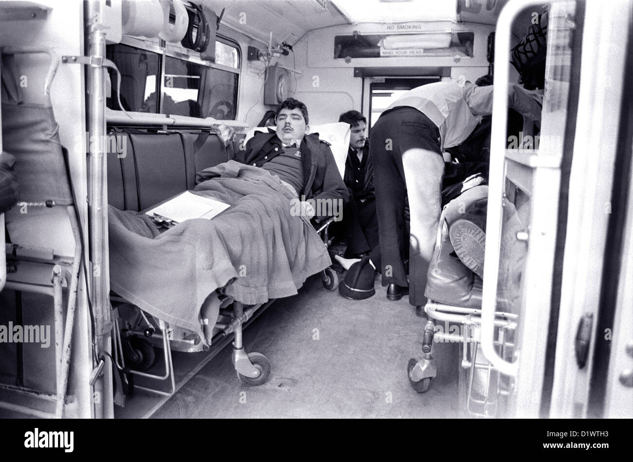 Injured police in and ambulance outside the NUM headquarters in ...