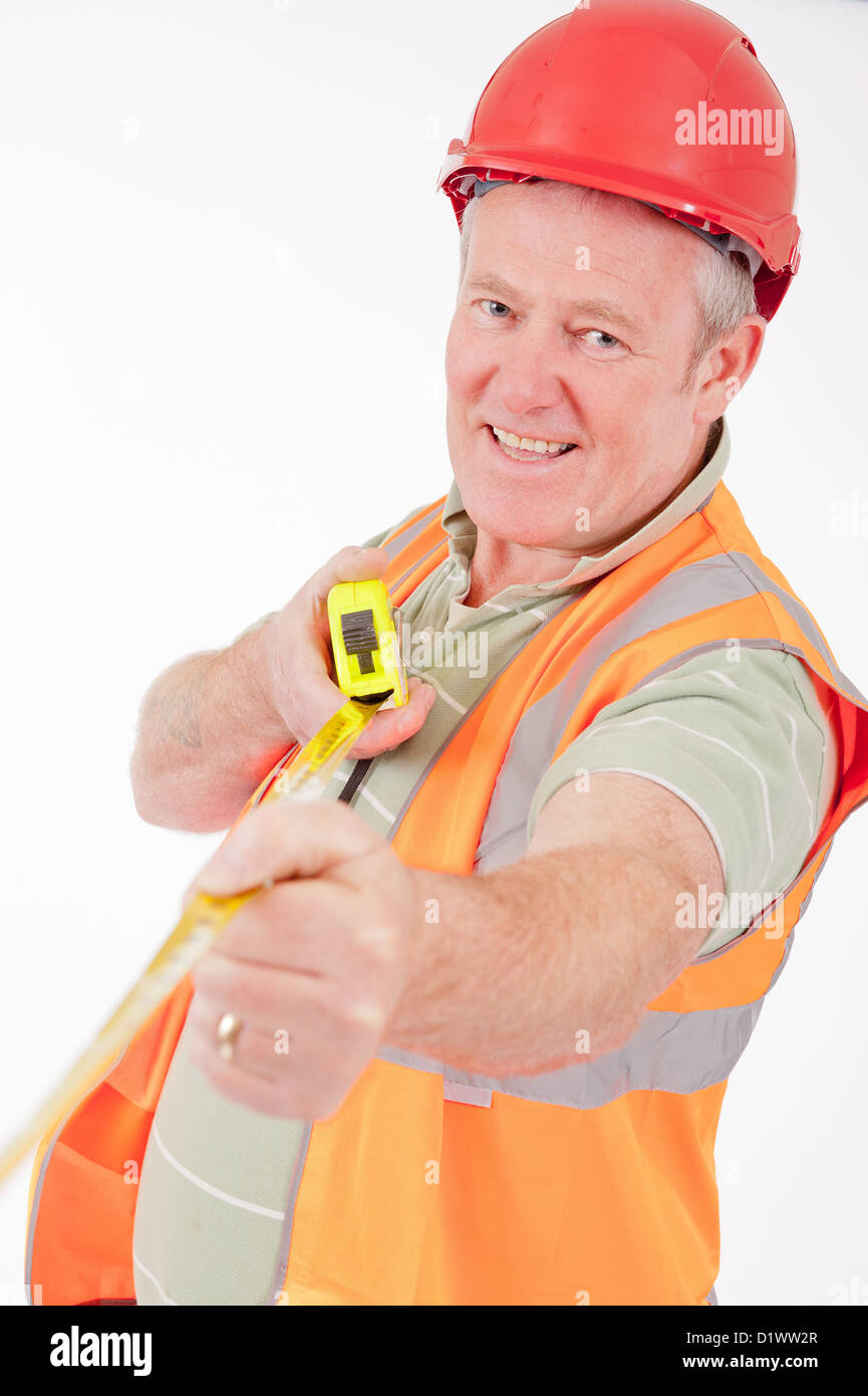 Portrait of a construction worker wearing a red hard hat & bright hi ...