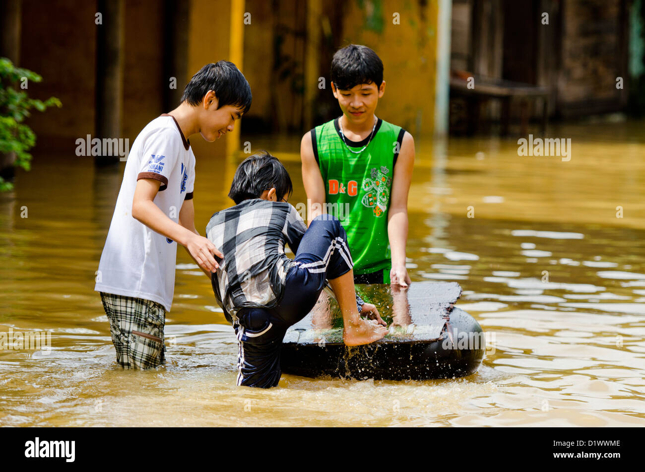 Playing in floods hi-res stock photography and images - Alamy