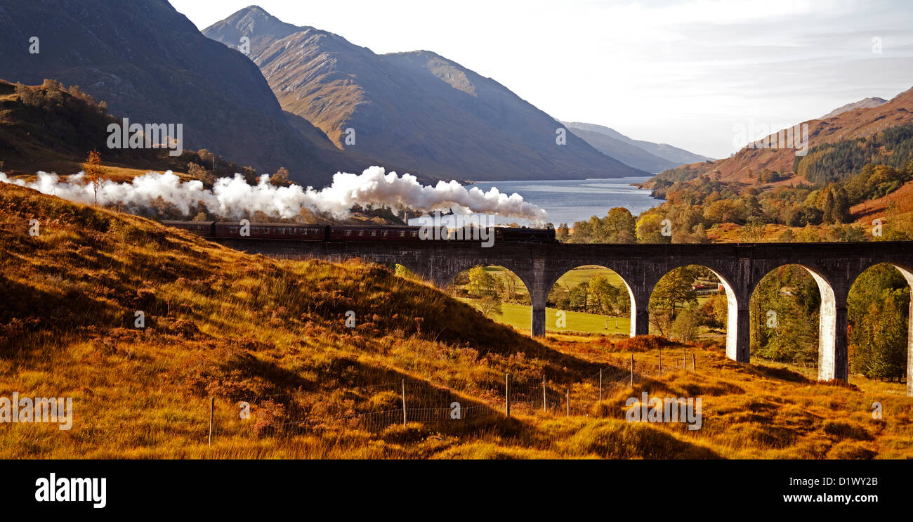 Jacobite Steam train, Glenfinnan Viaduct in autumn with Loch Shiel in ...