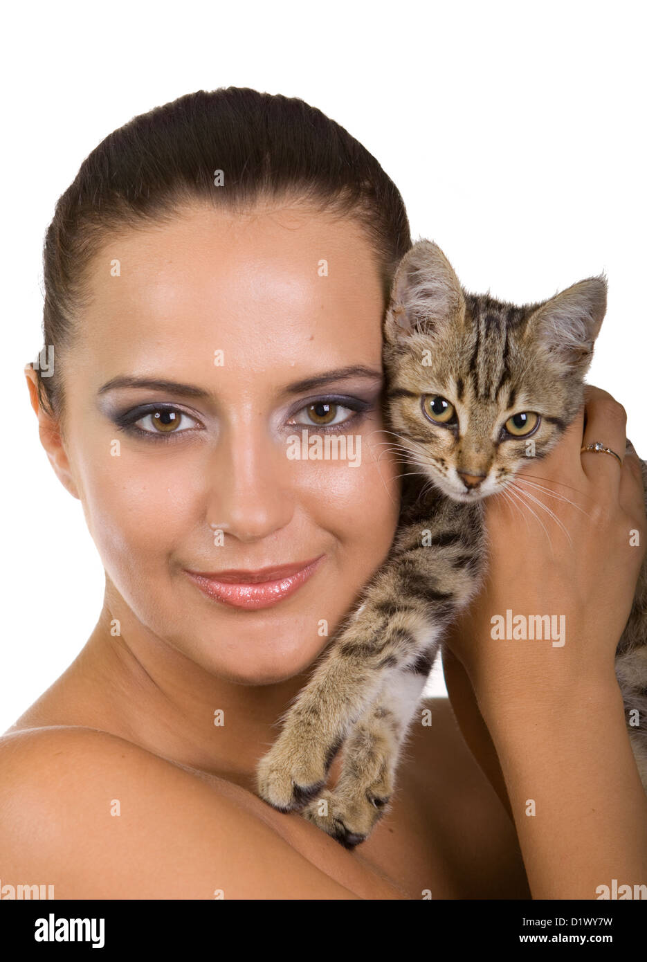 Beautiful young woman with adorable kitten Stock Photo - Alamy