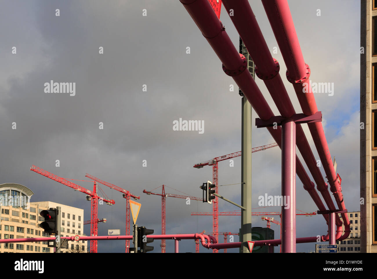 Overground pipes and cranes in new development on death strip in former ...