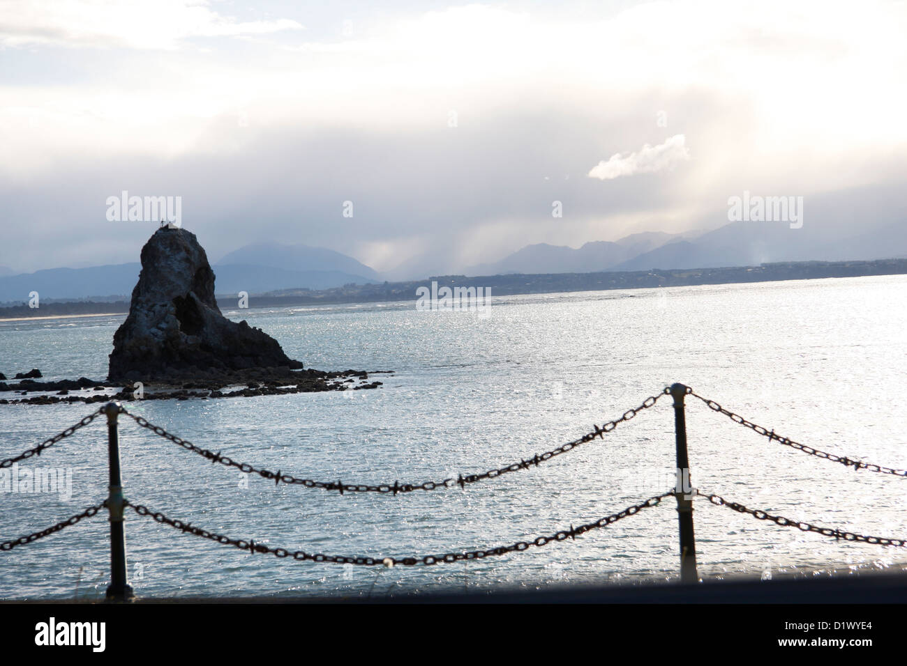 A rock pillar juts out from Tasman Bay, Nelson Stock Photo - Alamy