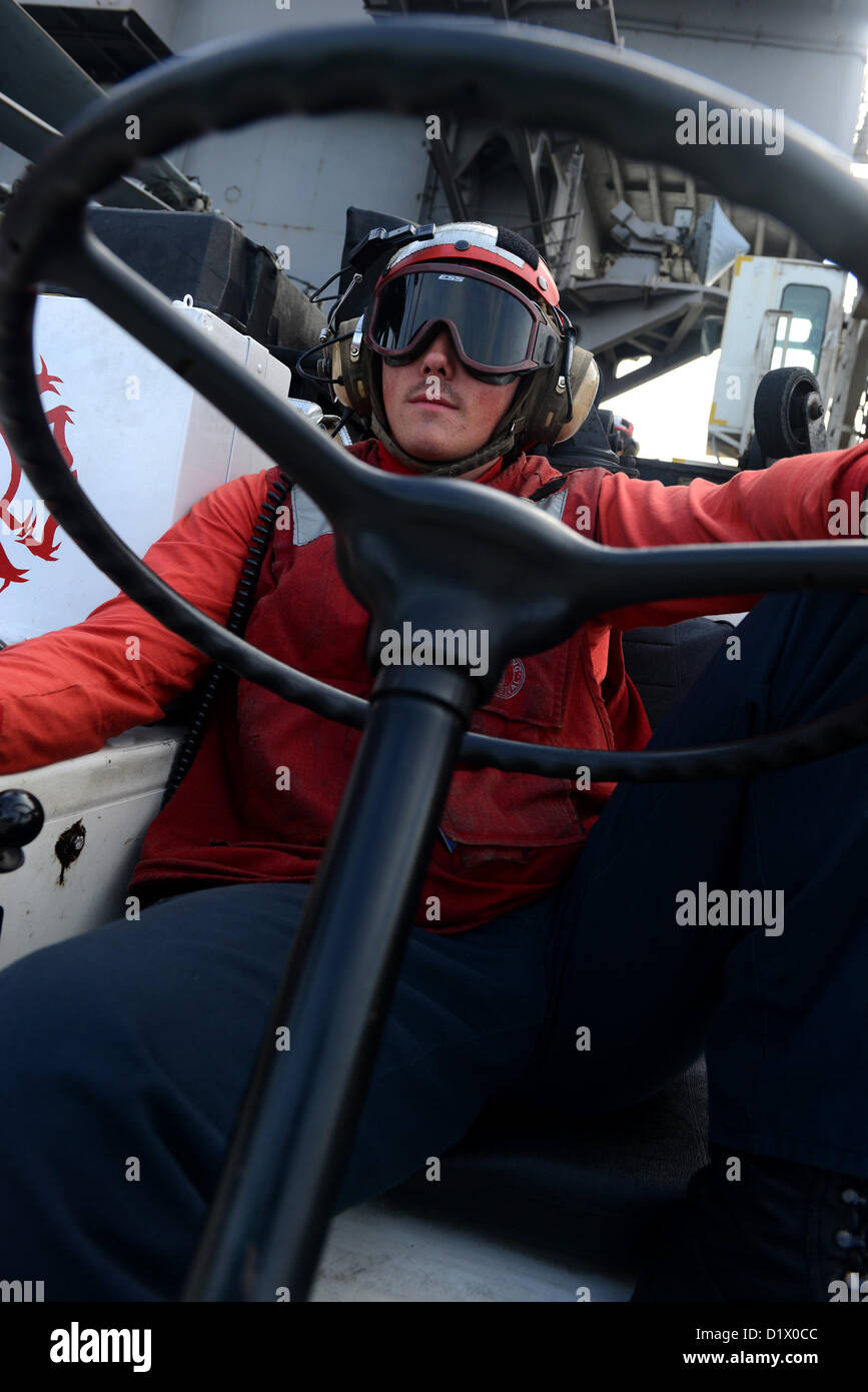 Aviation Boatswain's Mate Airman Matthew Barr observes flight ...