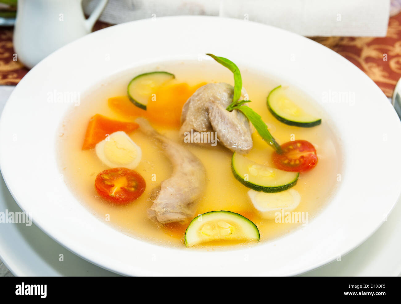 quail soup on a table at a restaurant Stock Photo - Alamy