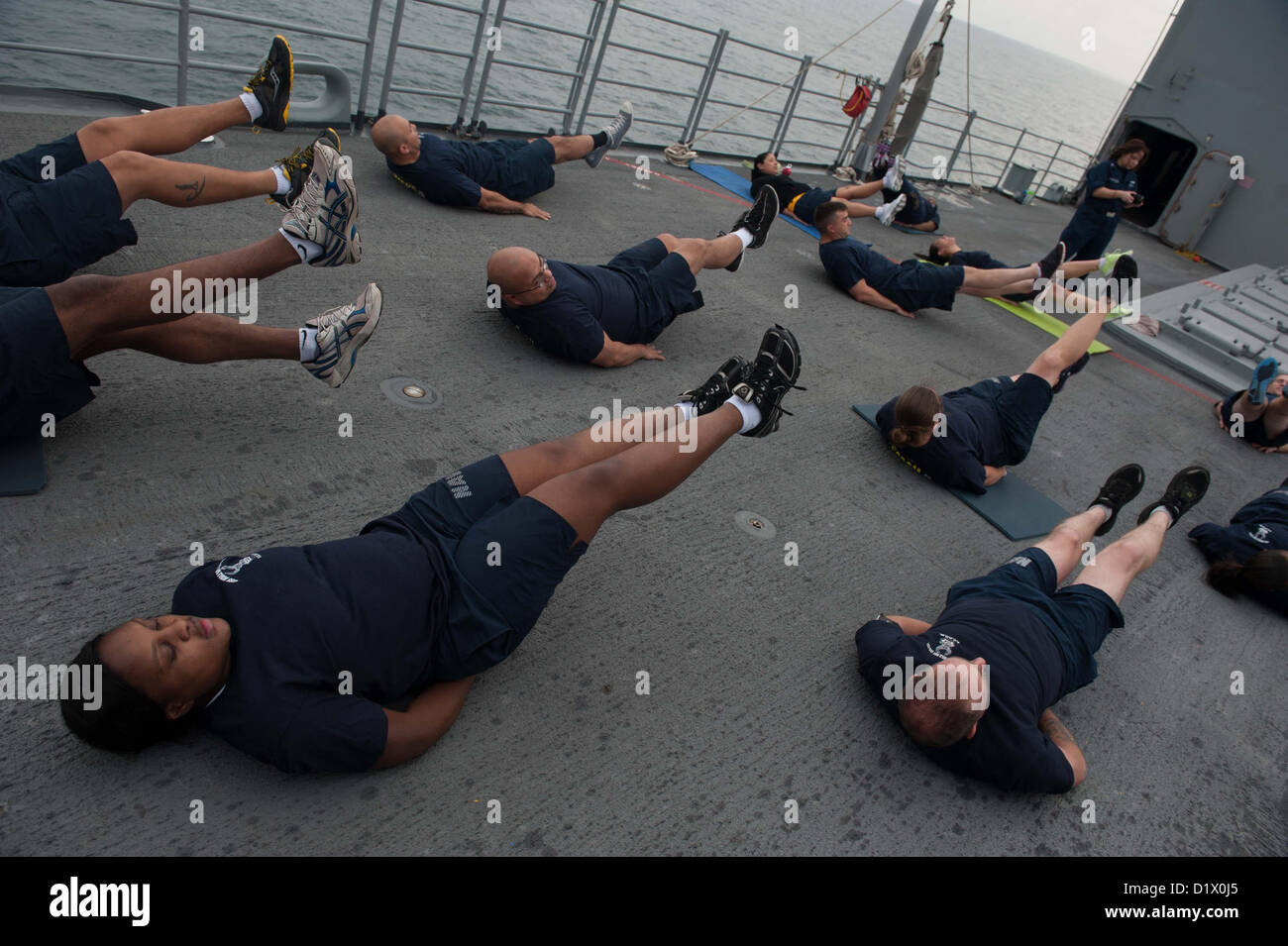 Sailors from the first class petty officer mess and the chief’s mess ...