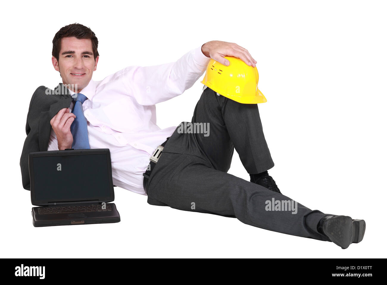 businessman lying down in his suit Stock Photo - Alamy