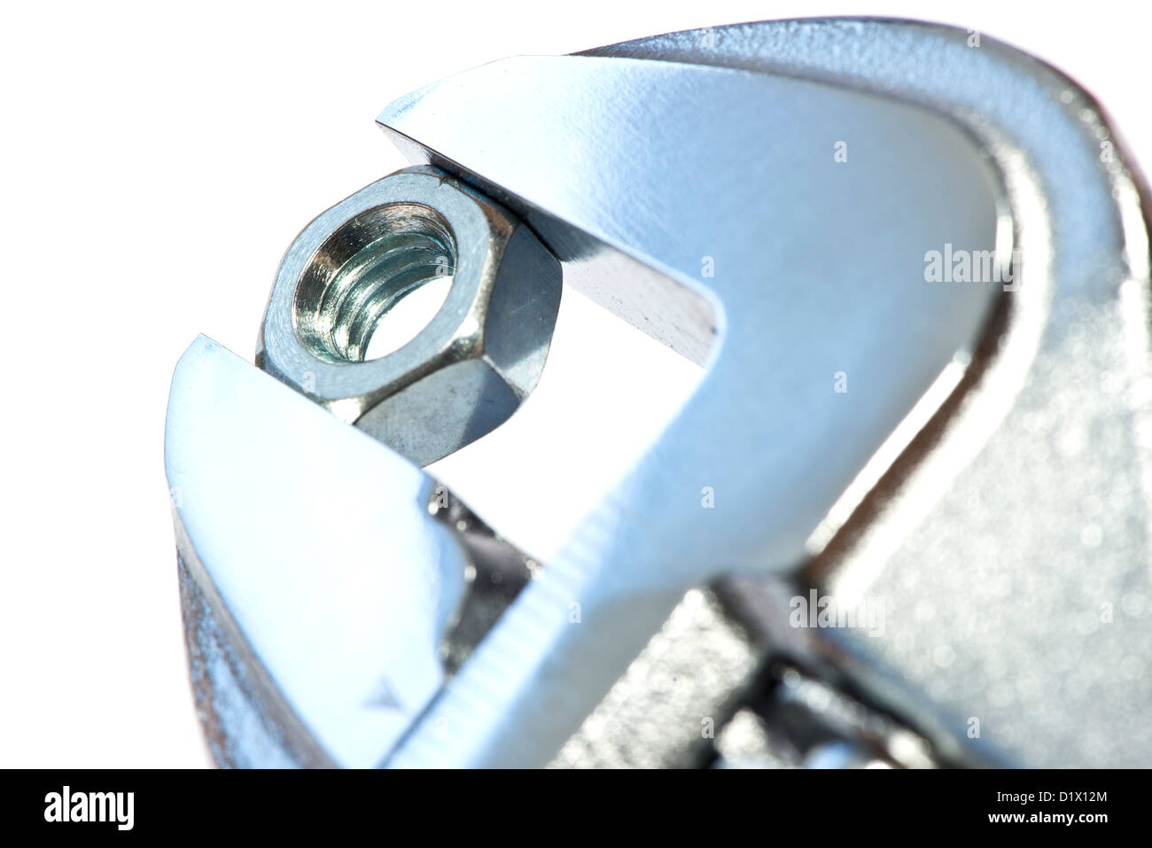 Wrench and screw on white background - closeup Stock Photo - Alamy