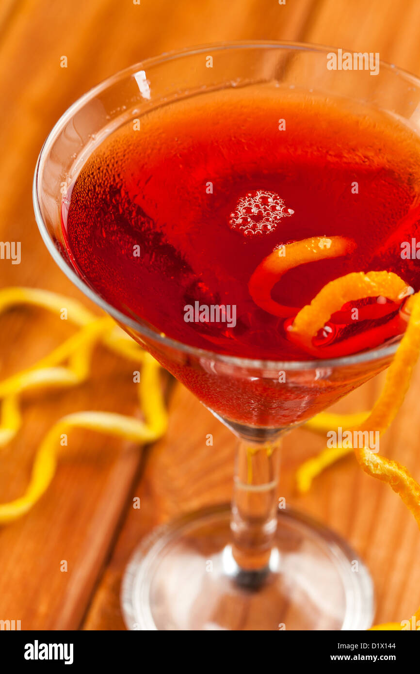 Drink in a triangle glass Stock Photo - Alamy
