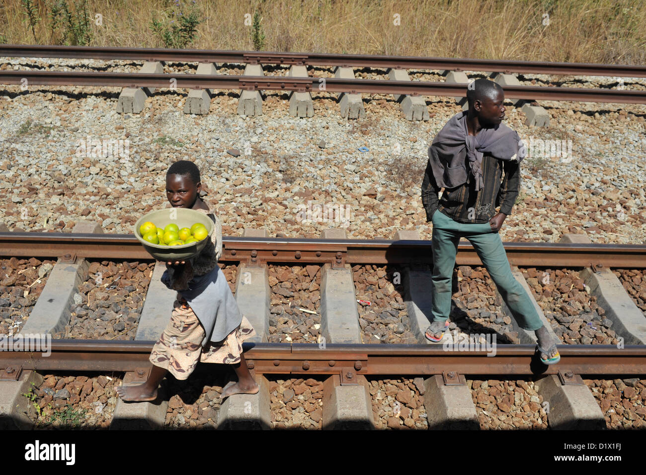 african waiting for the train Stock Photo - Alamy
