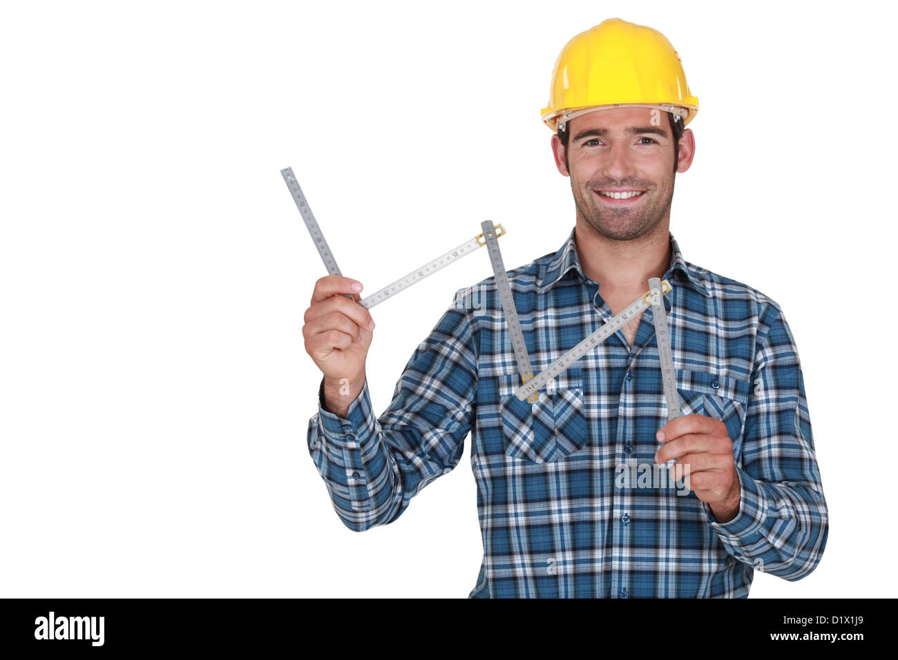 craftsman holding a meter Stock Photo - Alamy