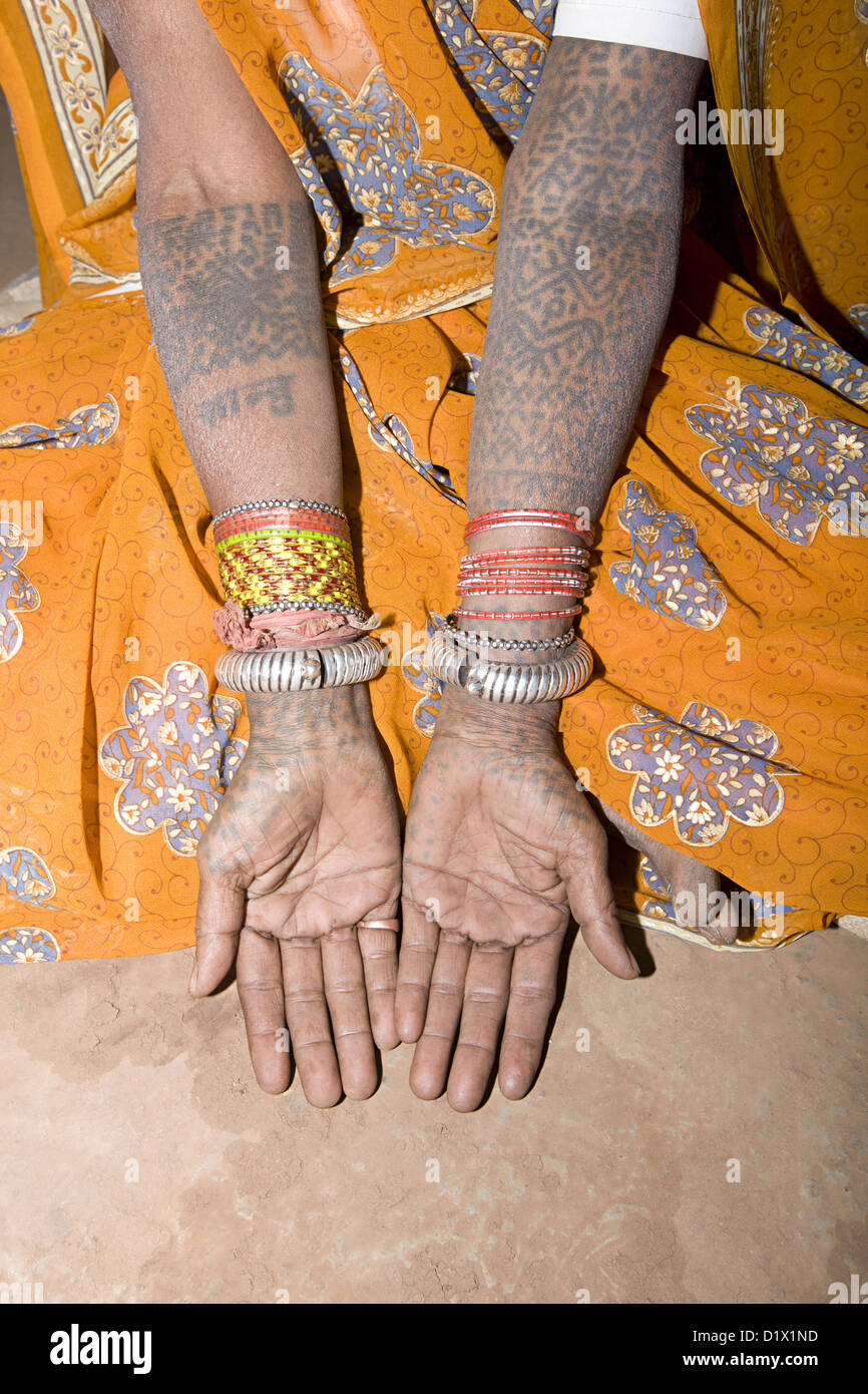 Korku Woman showing her tattooed hands and bangles. Khalwa ...