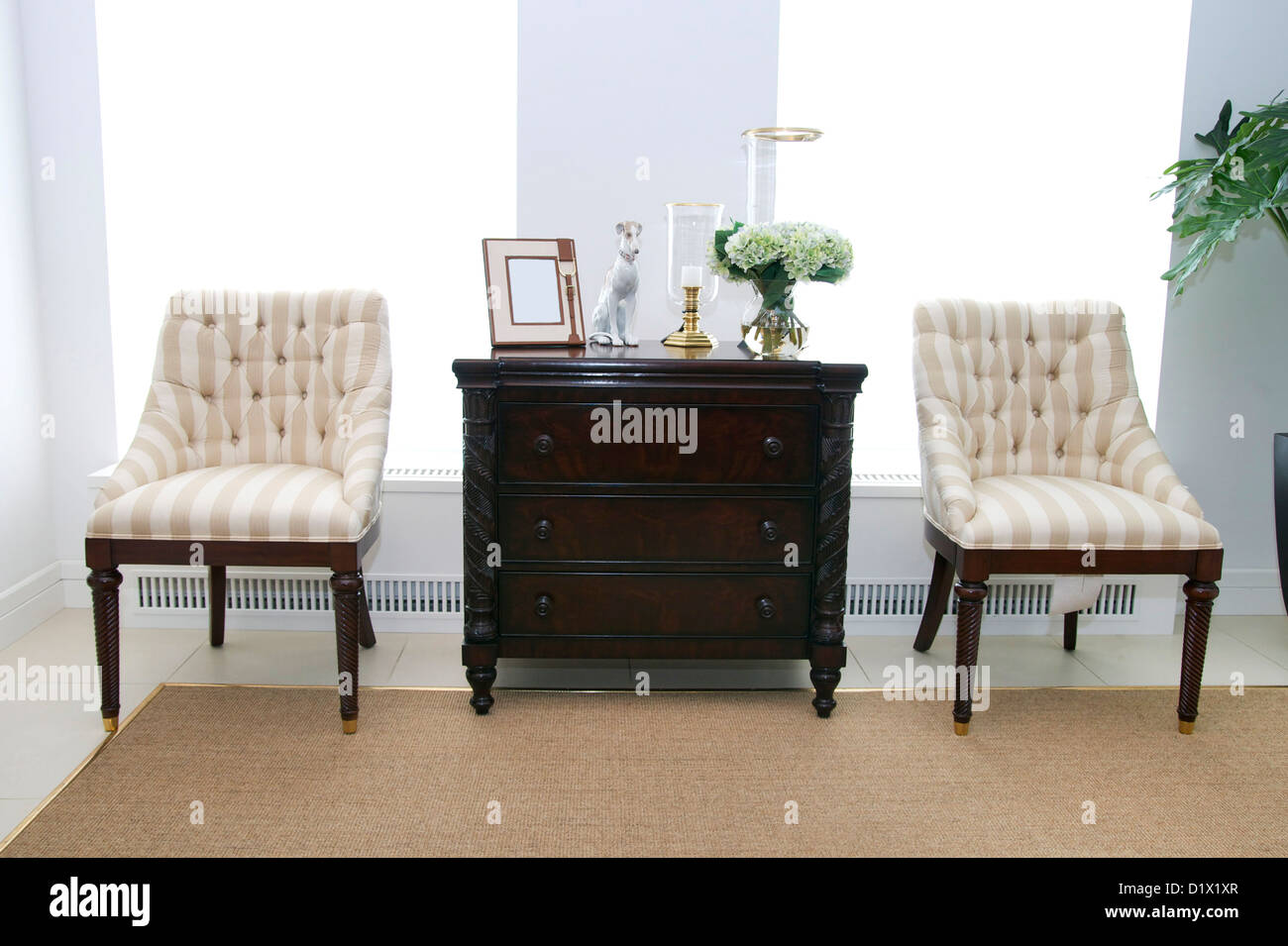 Two chairs front wall hi-res stock photography and images - Alamy