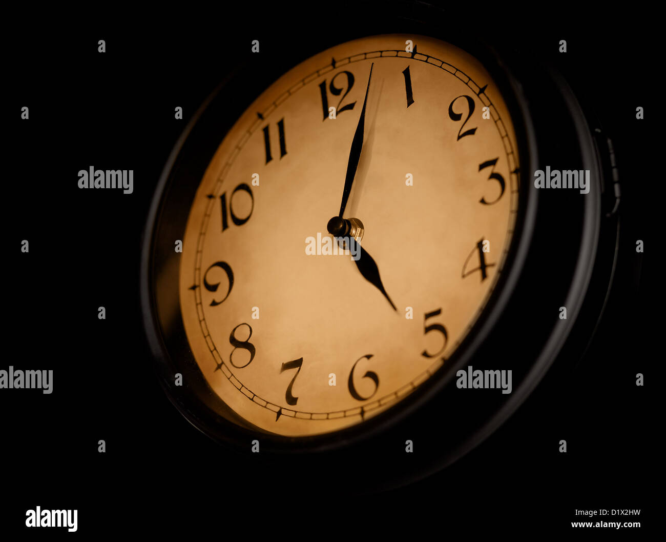 Antique clock dial on dark background Stock Photo - Alamy