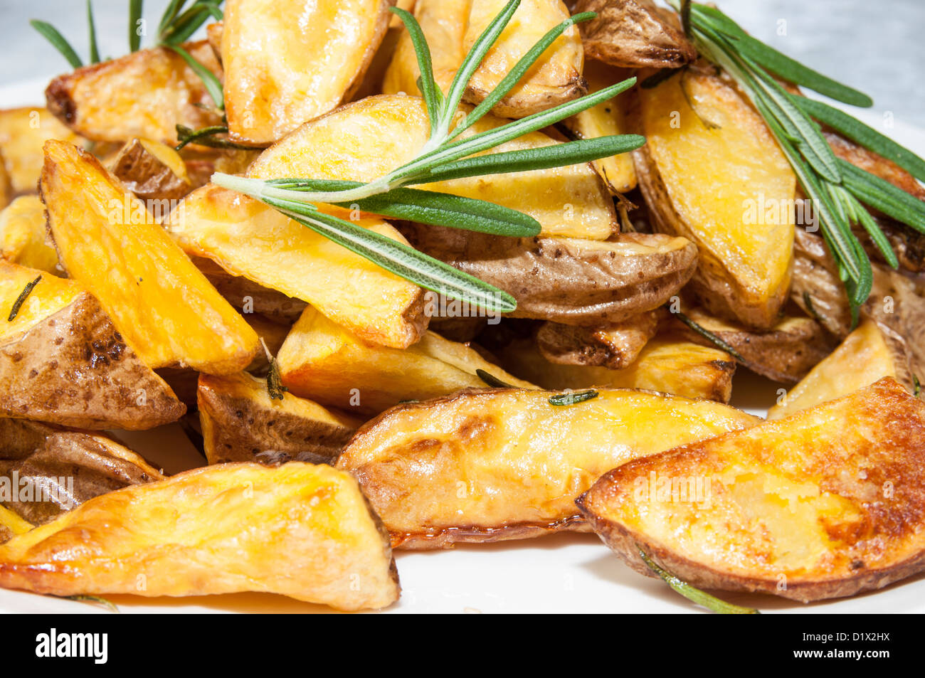 fried potatoes on a plate in a restaurant Stock Photo - Alamy