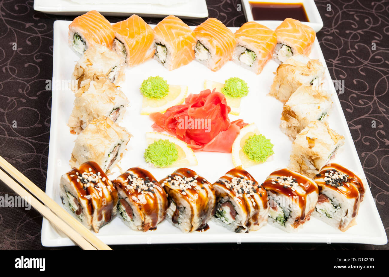 Japanese sushi on a table in a restaurant Stock Photo - Alamy