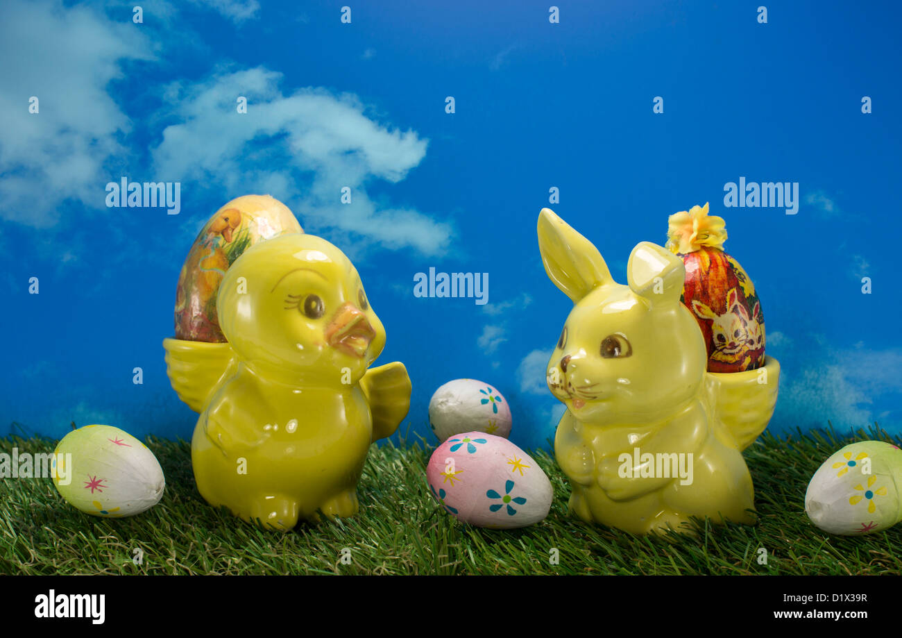 yellow easter duck and bunny with green grass and blue sky Stock Photo ...