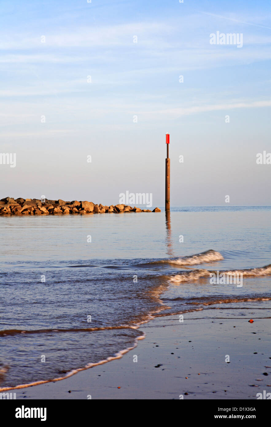 A view of the beach and calm sea with artificial reef at Sea Palling ...