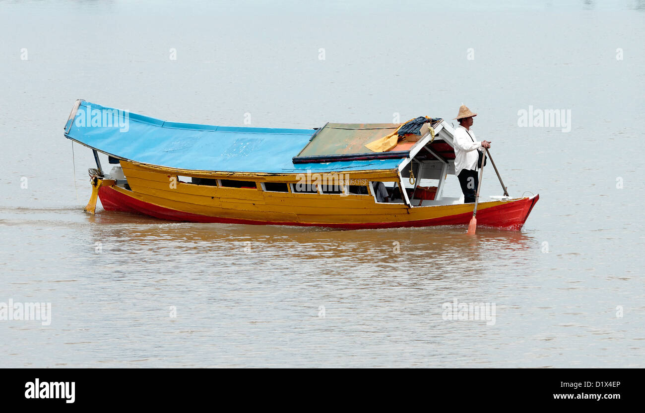 Water taxi Sampan on the Sarawak River, Kuching, Malaysia Stock Photo ...