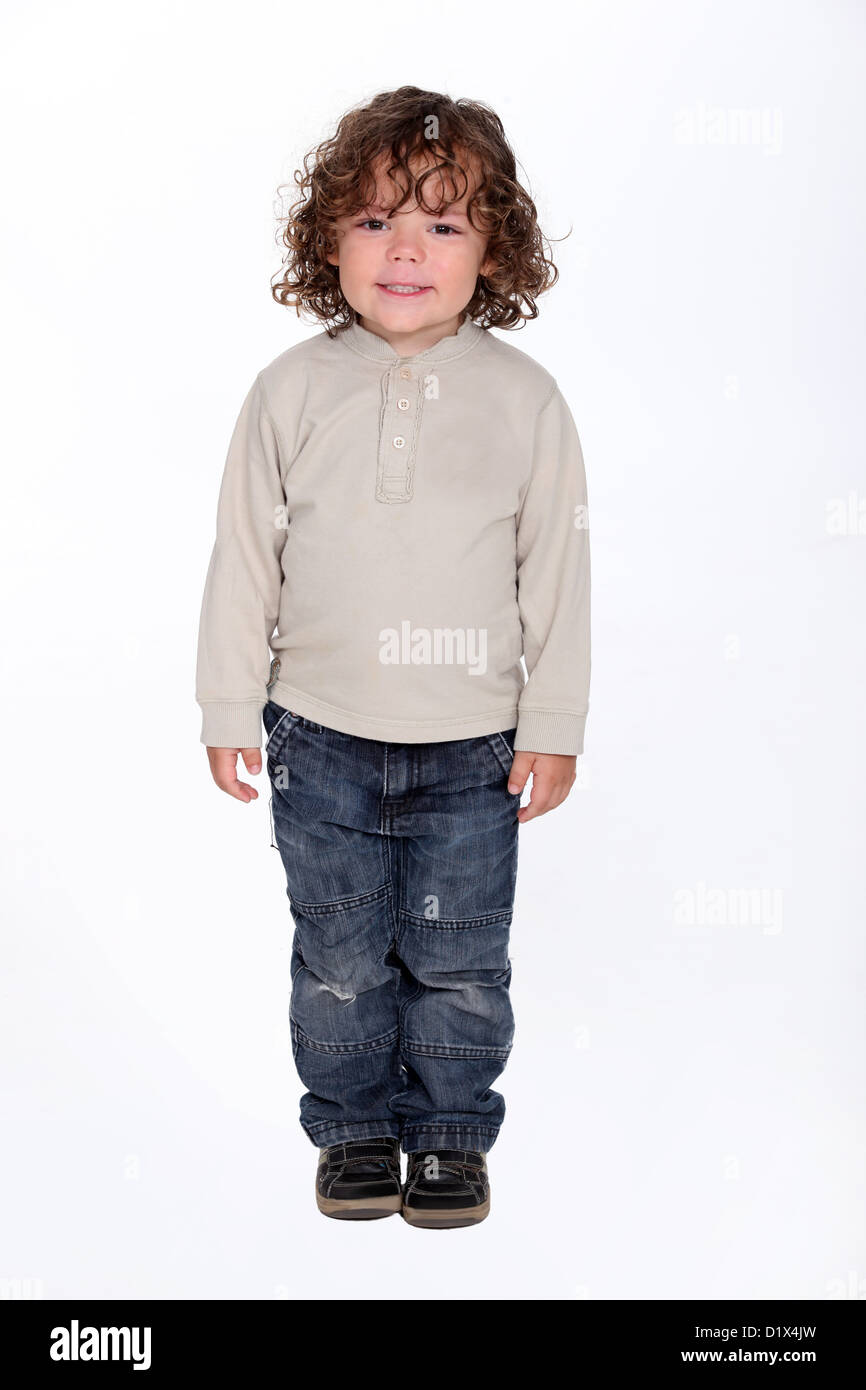 Cute little boy with playful smile Stock Photo - Alamy