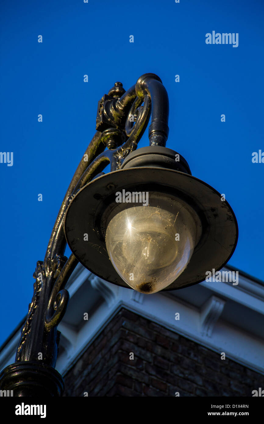 An old and worn dirty street light Stock Photo - Alamy