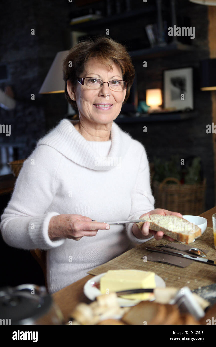 Elderly woman eating piece hi-res stock photography and images - Alamy