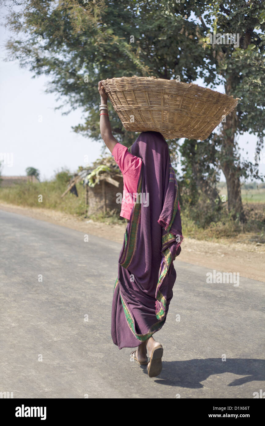 Tribal people carry hi-res stock photography and images - Alamy