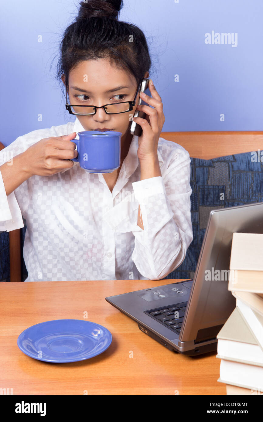 Young woman working with computer Stock Photo - Alamy