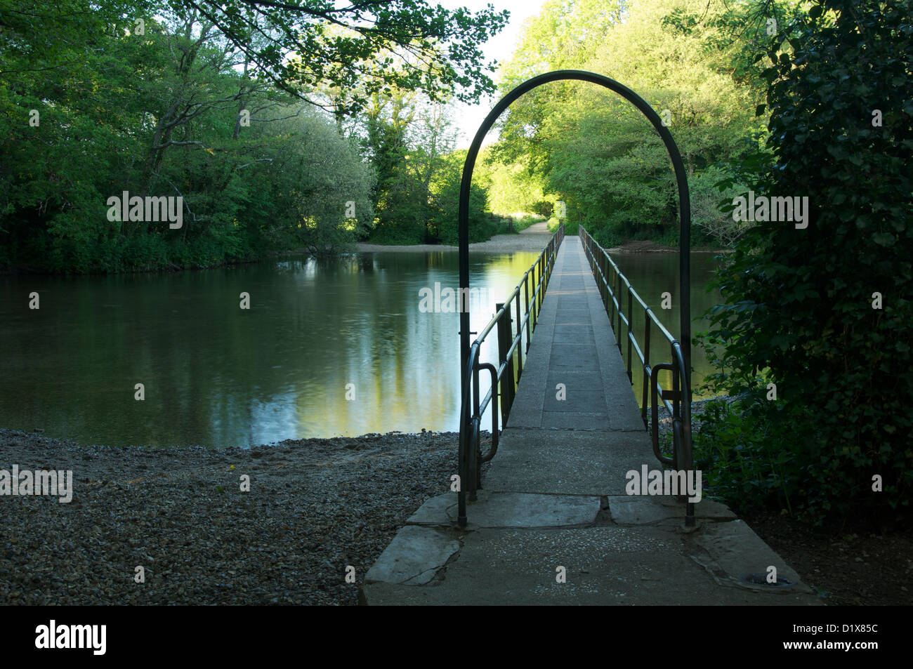 A tranquil summer evening by the ford at Moreton. A long pedestrian ...