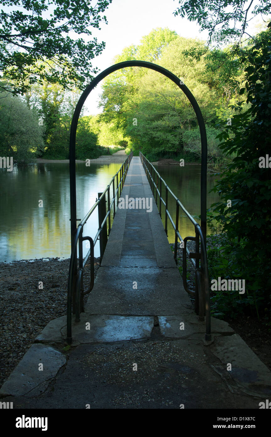 A tranquil summer evening by the ford at Moreton. A long pedestrian ...