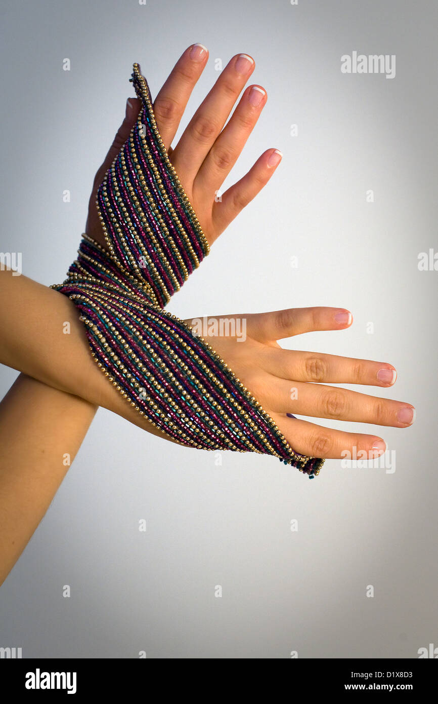 Female hand with beads Stock Photo - Alamy