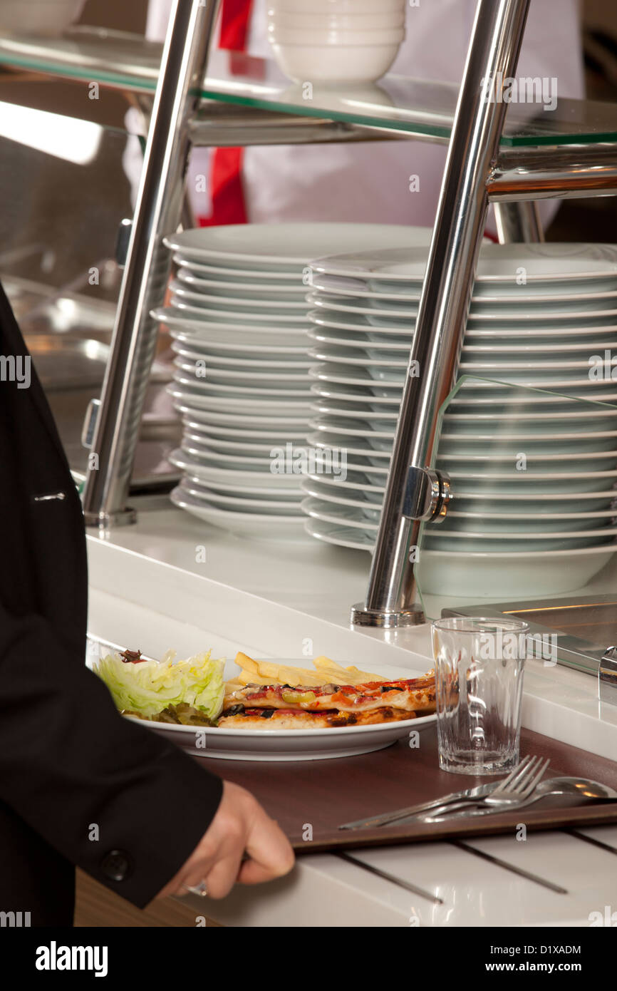 chef standing behind full lunch service station Stock Photo - Alamy