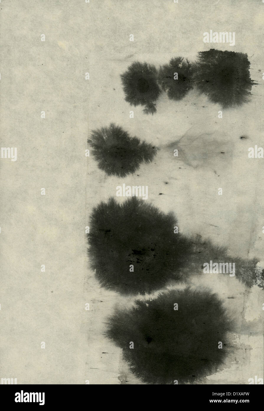 Black ink blotches abstract painting on mulberry paper Stock Photo - Alamy