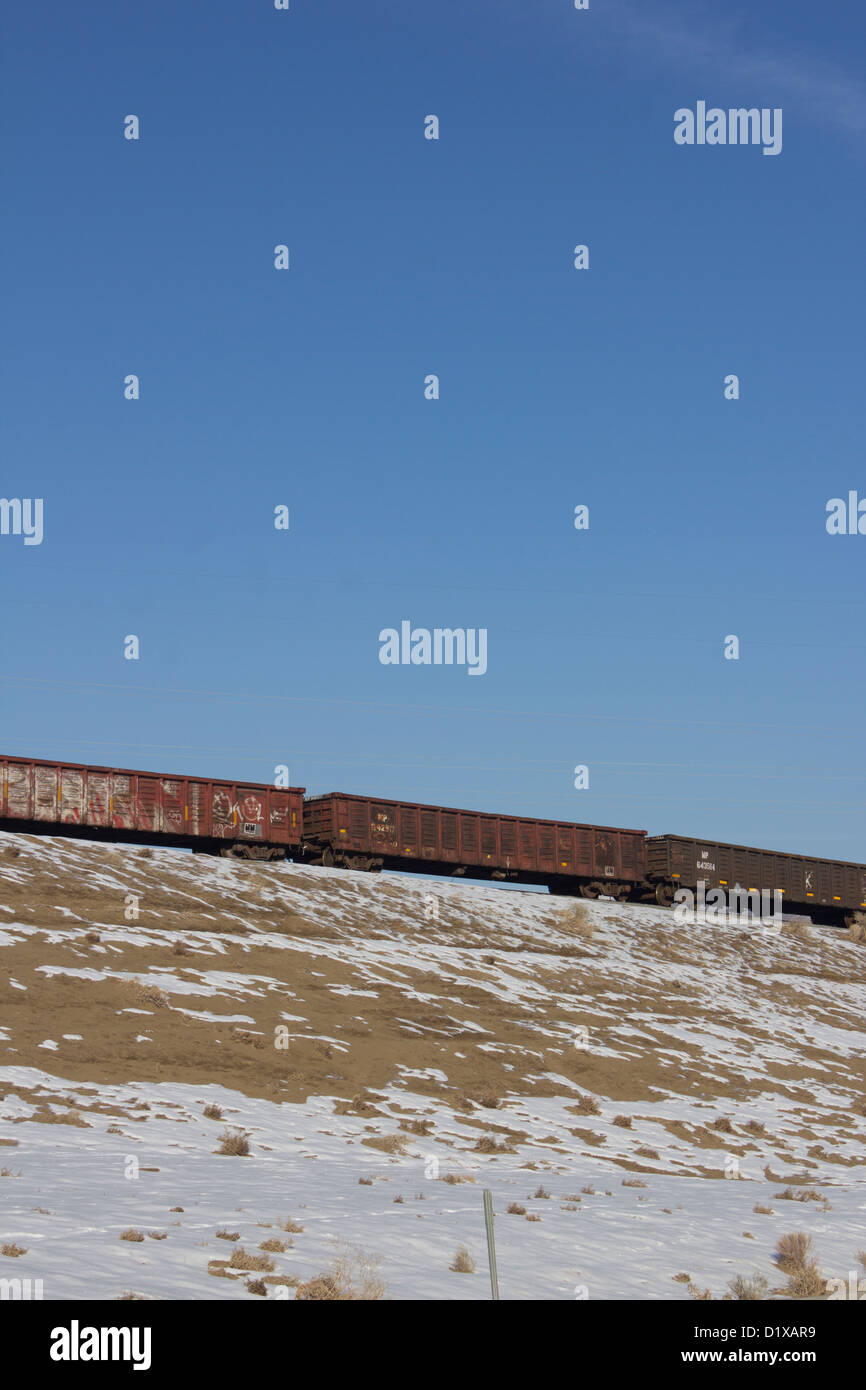 A long freight train hauls cargo across the country for consumer and ...