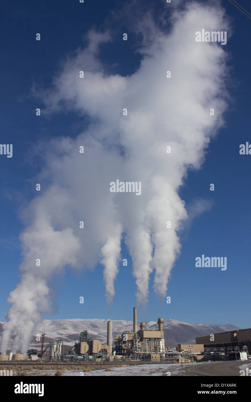 Power Plant smokestacks with blue skies and mountains Stock Photo - Alamy