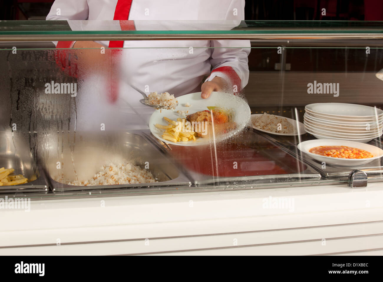 chef standing behind full lunch service station Stock Photo - Alamy