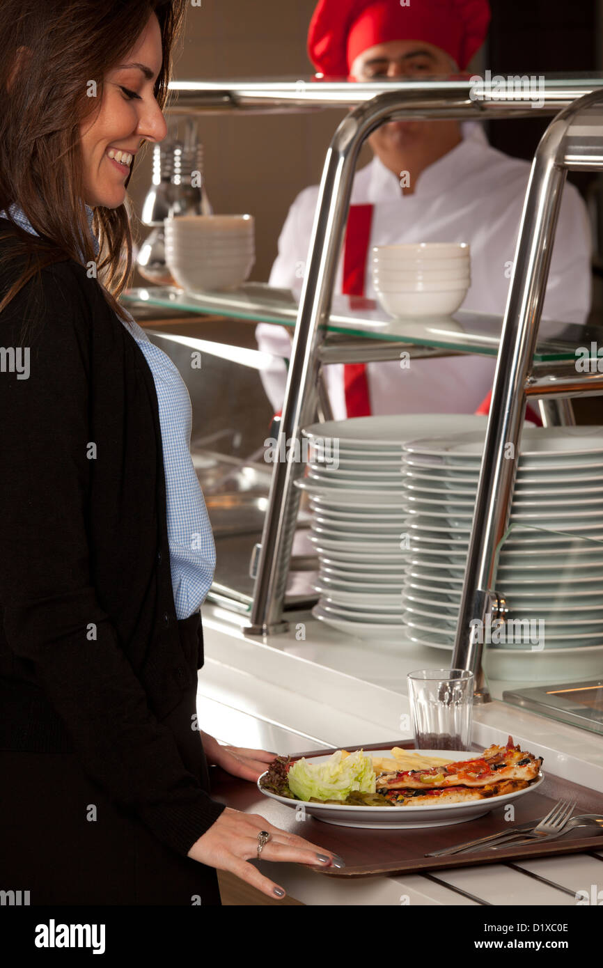 Business woman take cafeteria lunch Stock Photo - Alamy