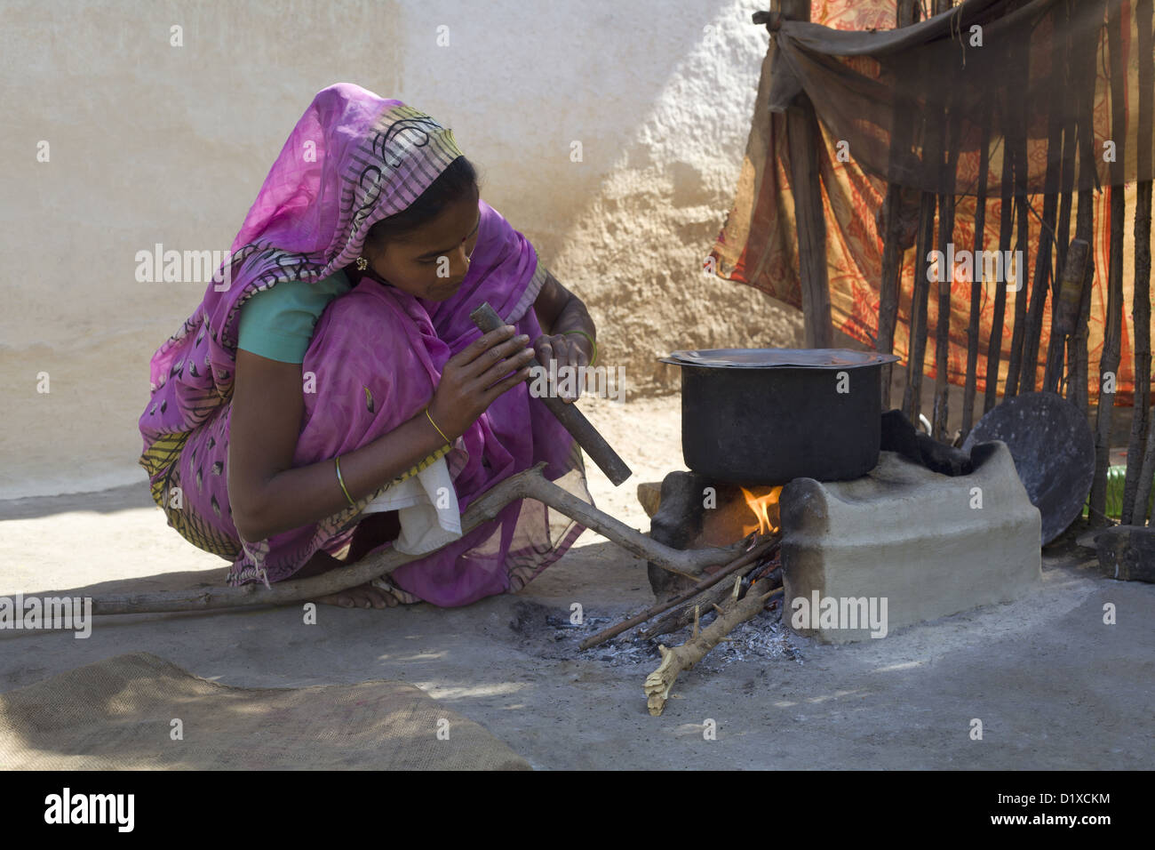 Tribal woman cooking on a Chulla ( Cooking stove Stock Photo - Alamy
