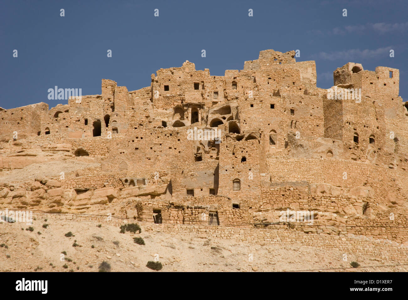The Berber village of Chenini nearTatouine in the Sahara desert in ...