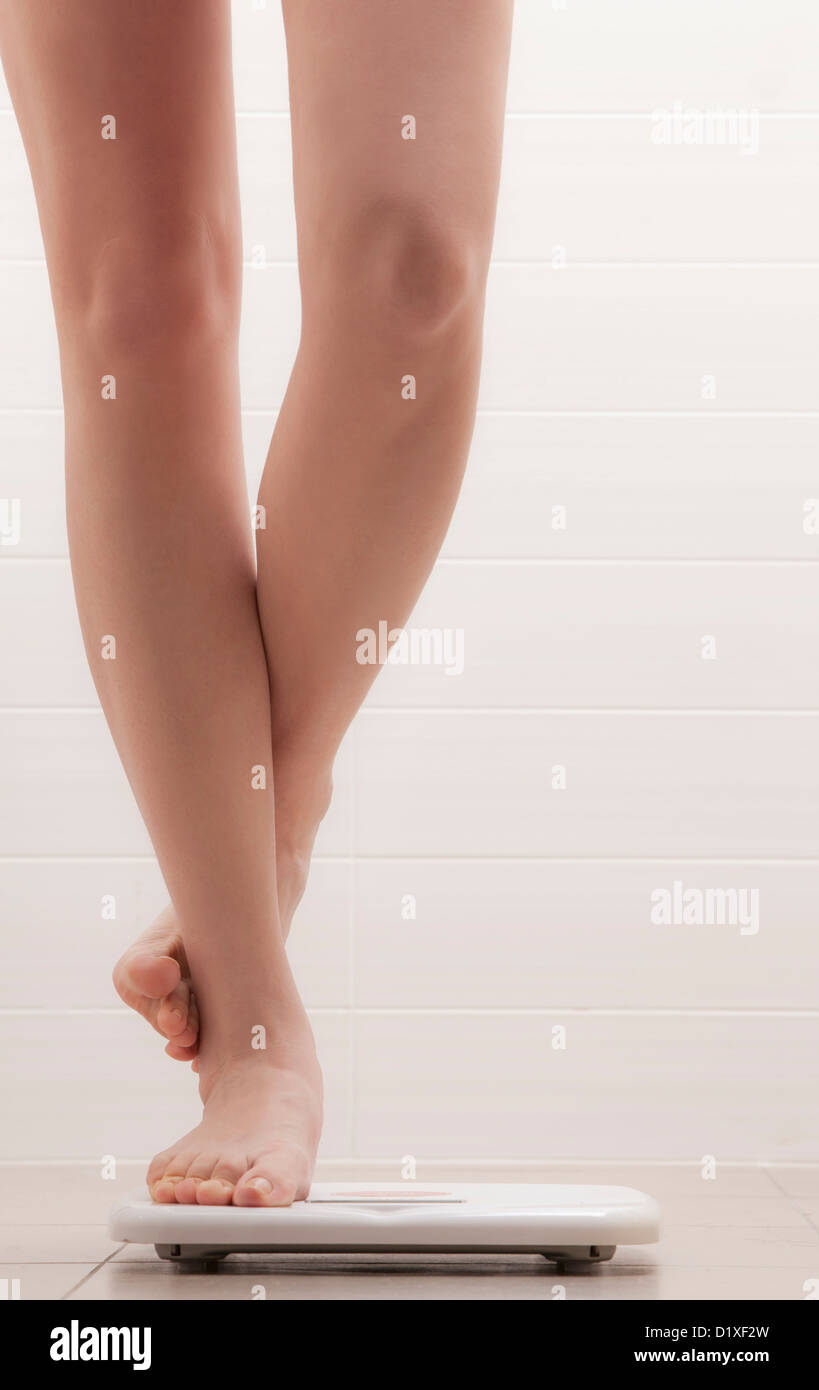 Weighing scales feet hi-res stock photography and images - Alamy