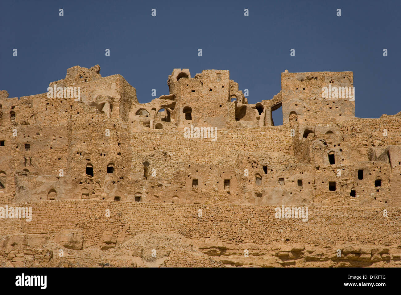 The Berber village of Chenini nearTatouine in the Sahara desert in ...
