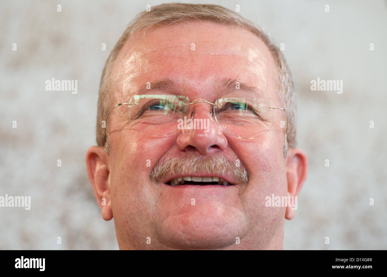 Former Porsche CEO Wendelin Wiedeking smiles at a press conference on ...