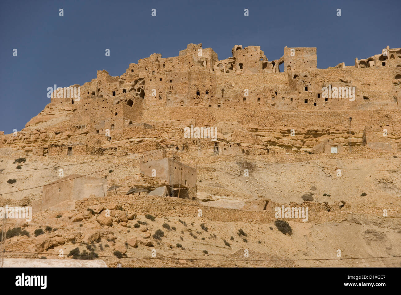 The Berber village of Chenini nearTatouine in the Sahara desert in ...