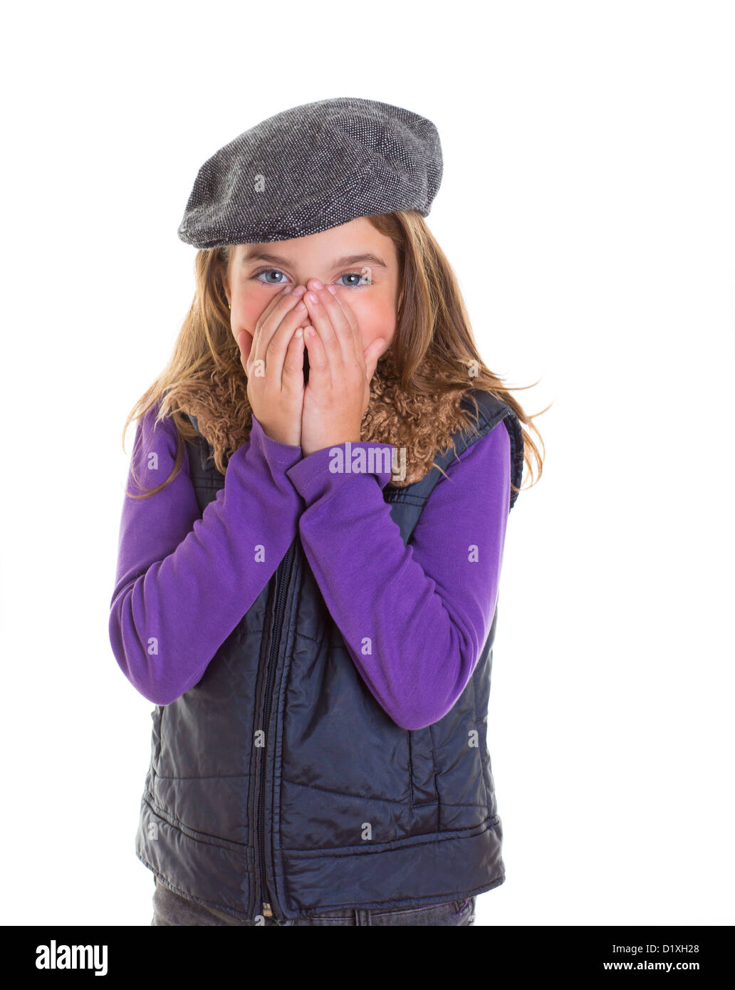 Child kid shy girl smiling hiding her face with hands with winter cap ...