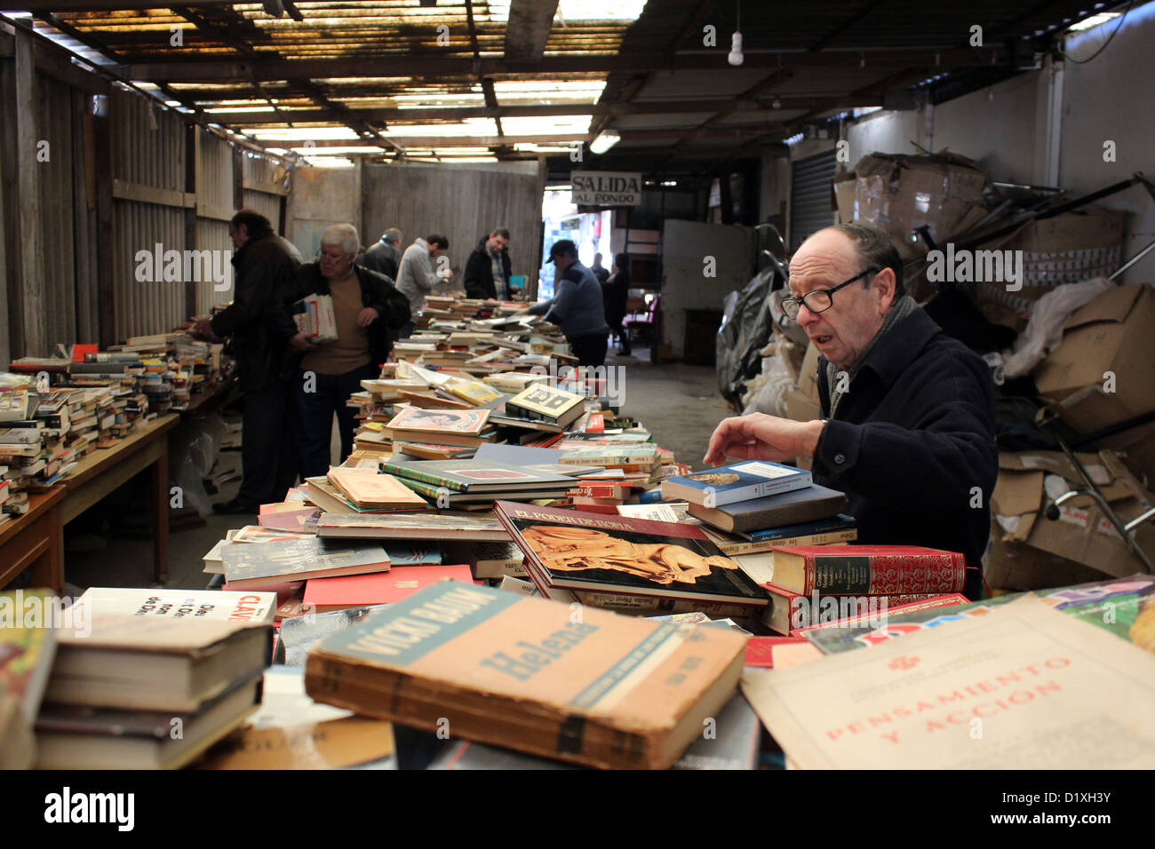 Customers and collectors browsing used old books at the antique Mercat ...
