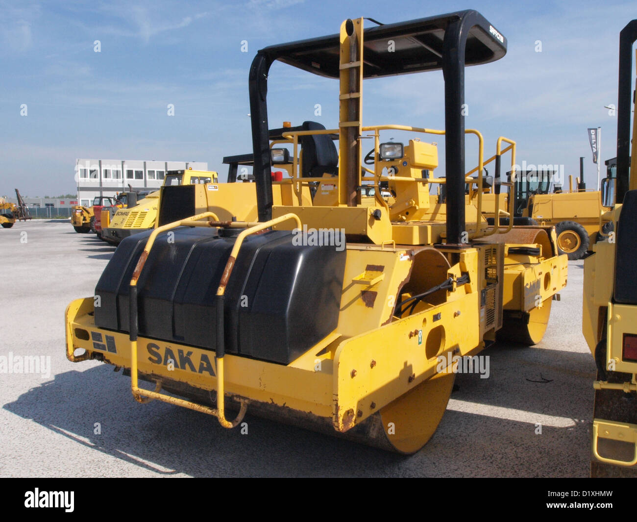 The Sakai SW900 is a heavy-duty road roller used for compaction in ...