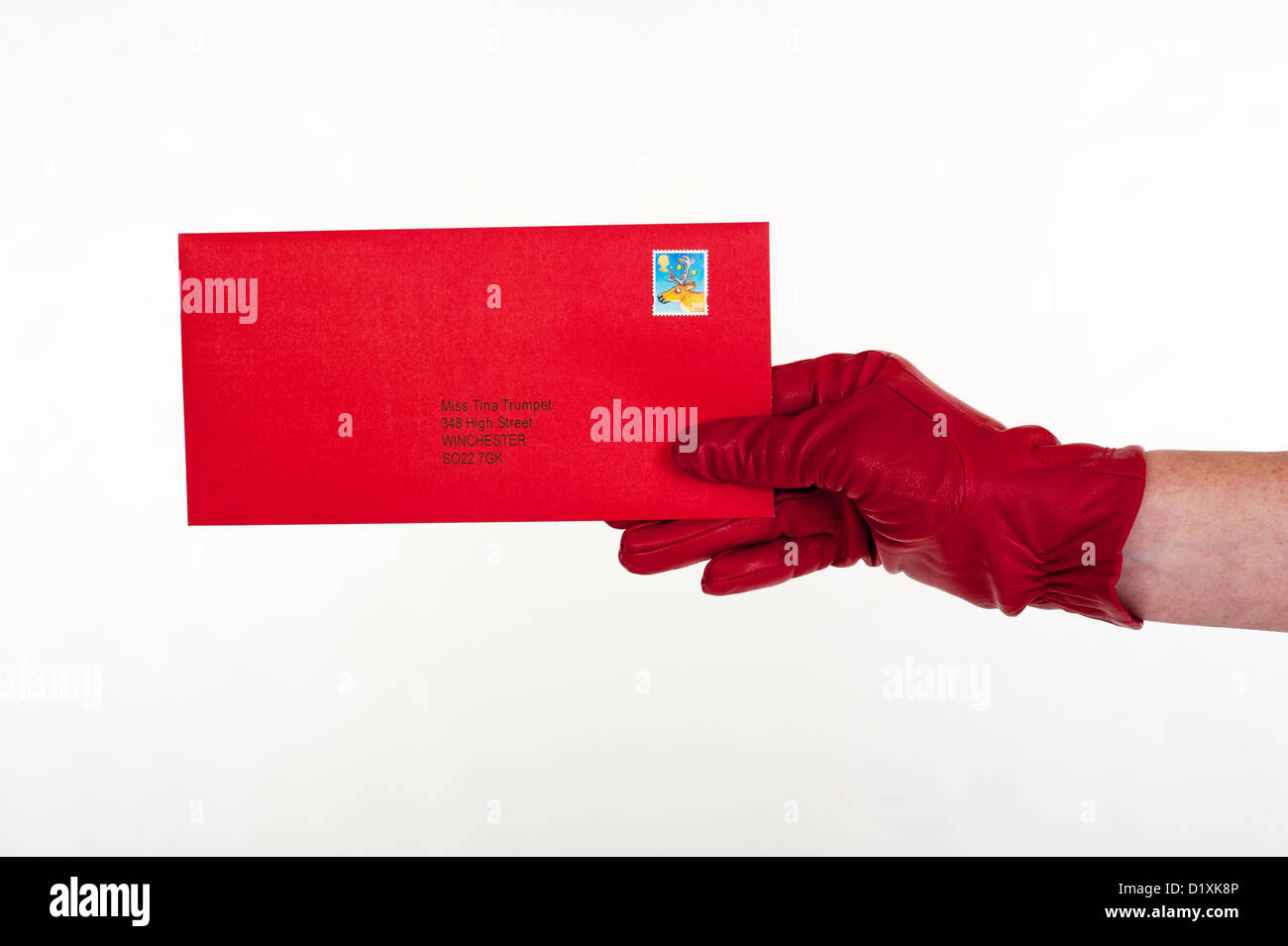 Red Letter Day woman's red gloved hand holding an important ...