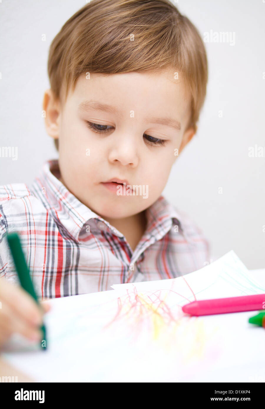 Boy Using Crayons High Resolution Stock Photography and Images - Alamy