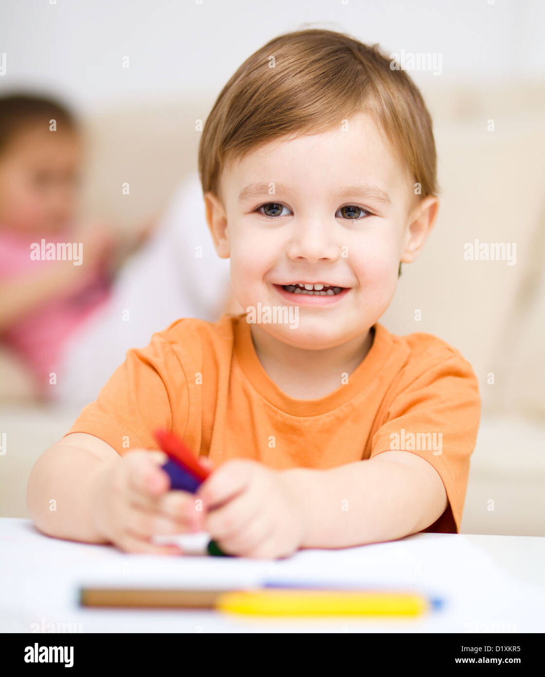 Boy Using Crayons High Resolution Stock Photography and Images - Alamy