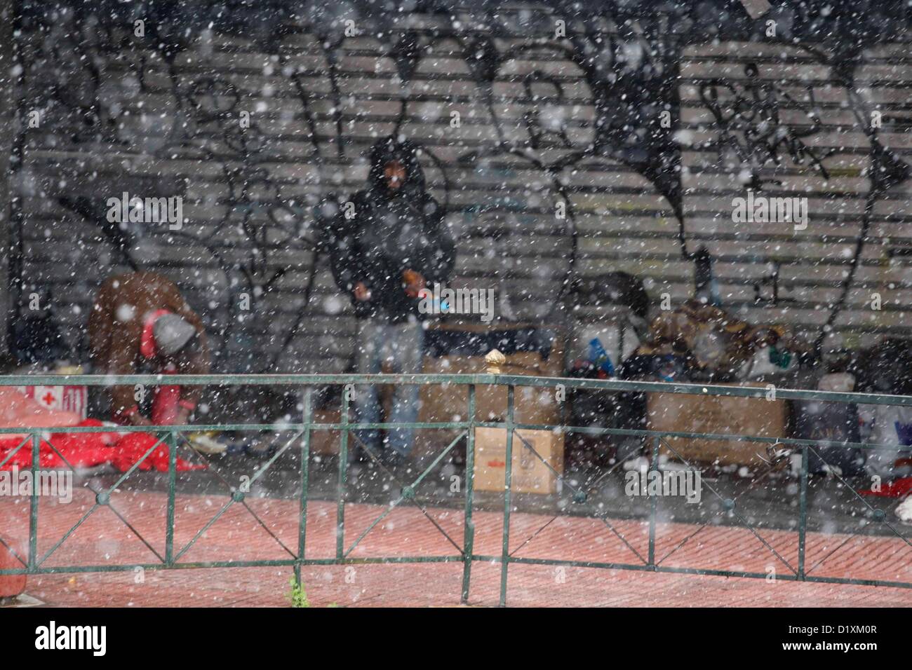 Jan. 8, 2013 - Athens, Greece - Homeless people stand outside during ...